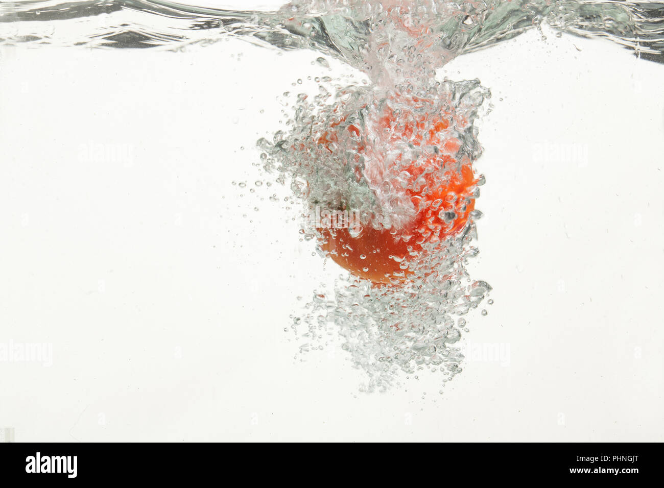 Tomato drop in water splash hi-res stock photography and images - Alamy