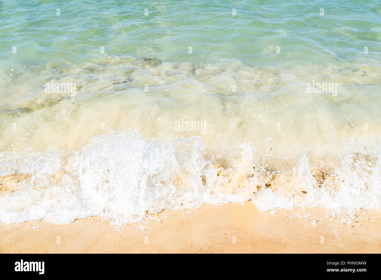 Sea wave on beach Stock Photo - Alamy
