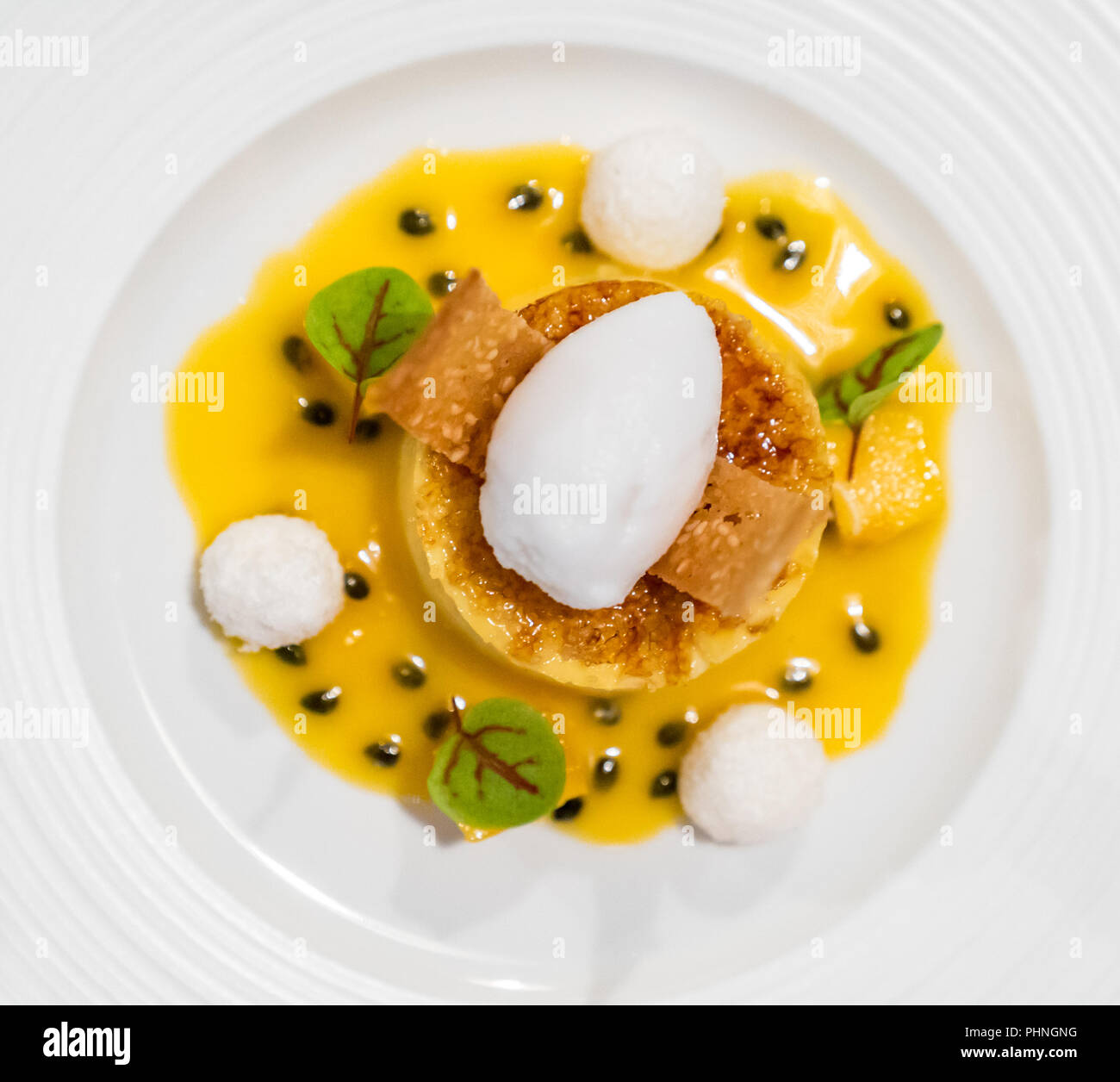 Passionfruit cream brulee Stock Photo - Alamy