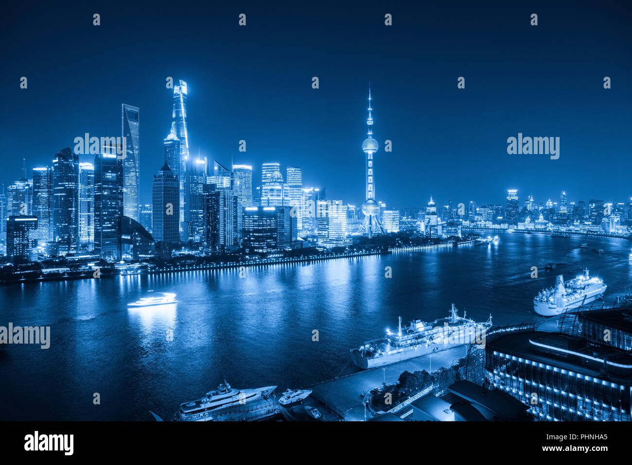 shanghai skyline at night with blue tone Stock Photo - Alamy