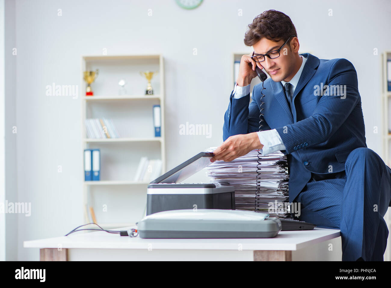 Making copies in office hi-res stock photography and images - Alamy