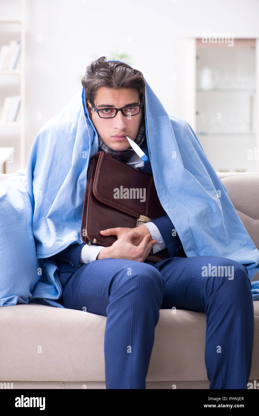 Sick employee staying at home suffering from flue Stock Photo - Alamy
