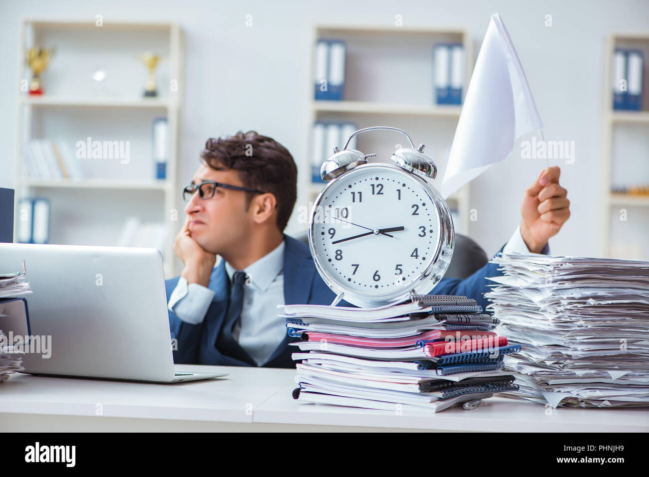 Man holding clock waving hand hi-res stock photography and images - Alamy