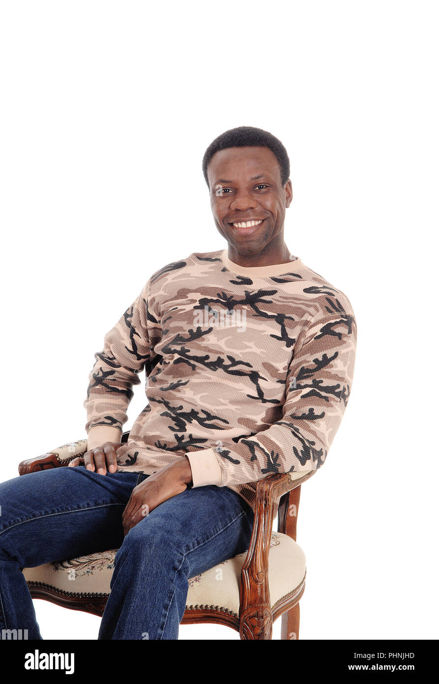 Man sitting on chair hi-res stock photography and images - Alamy