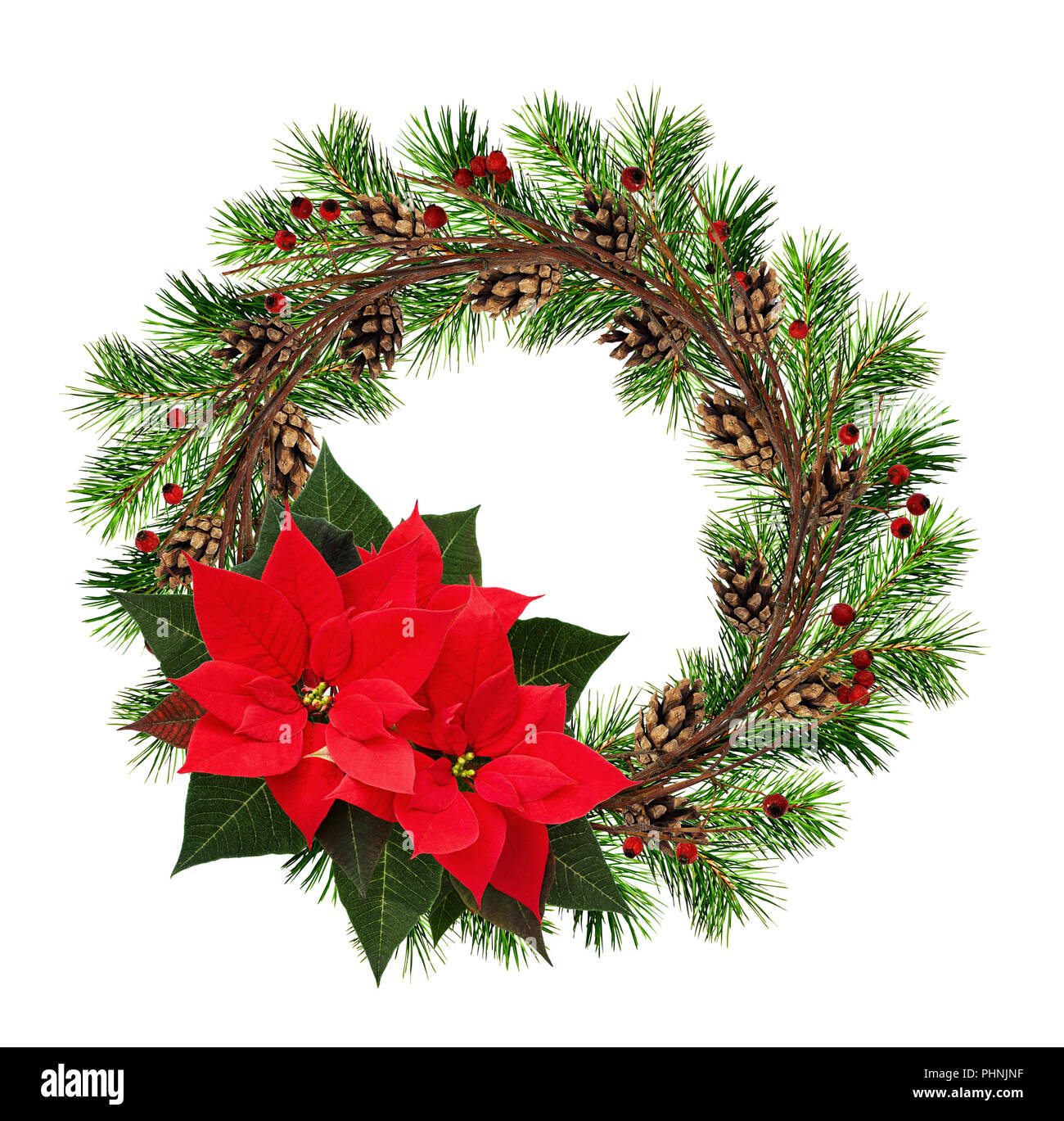 Round wreath from dry twigs and Christmas tree branches with red ...