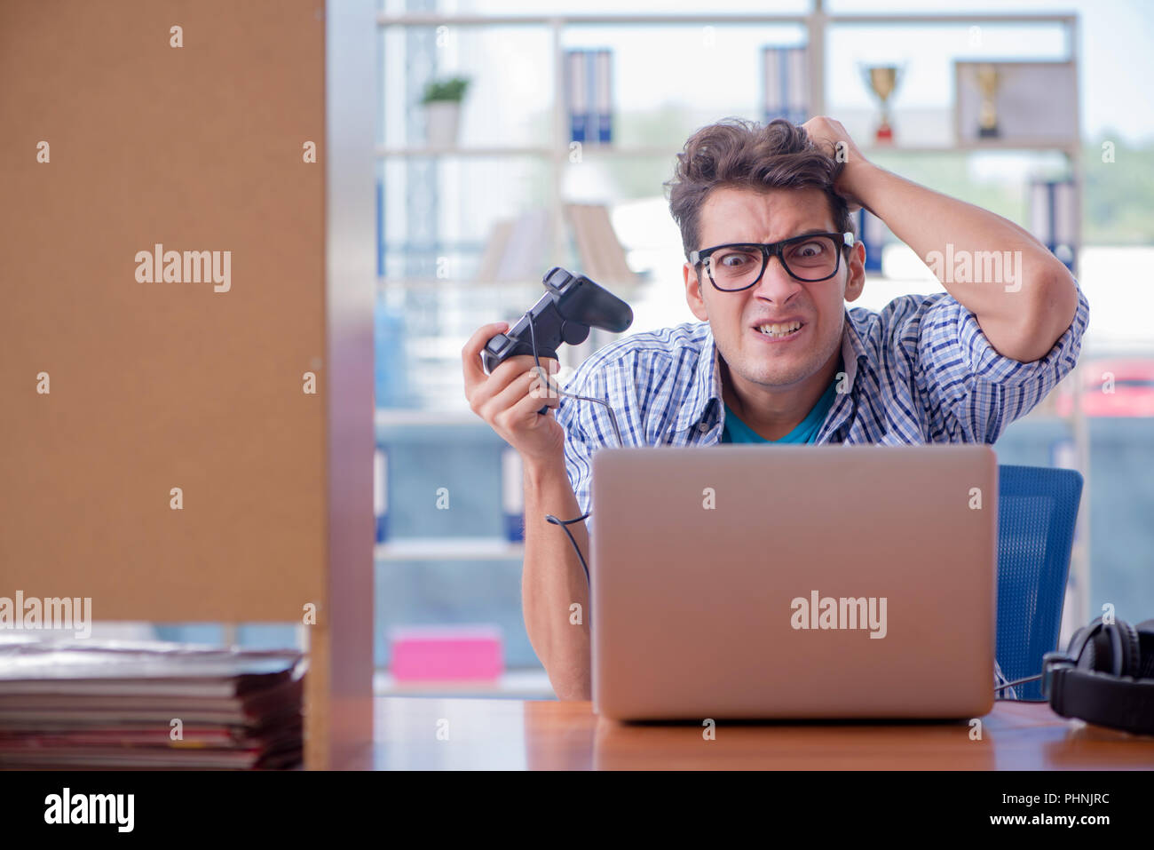 Gamer addict playing computer games at home Stock Photo - Alamy