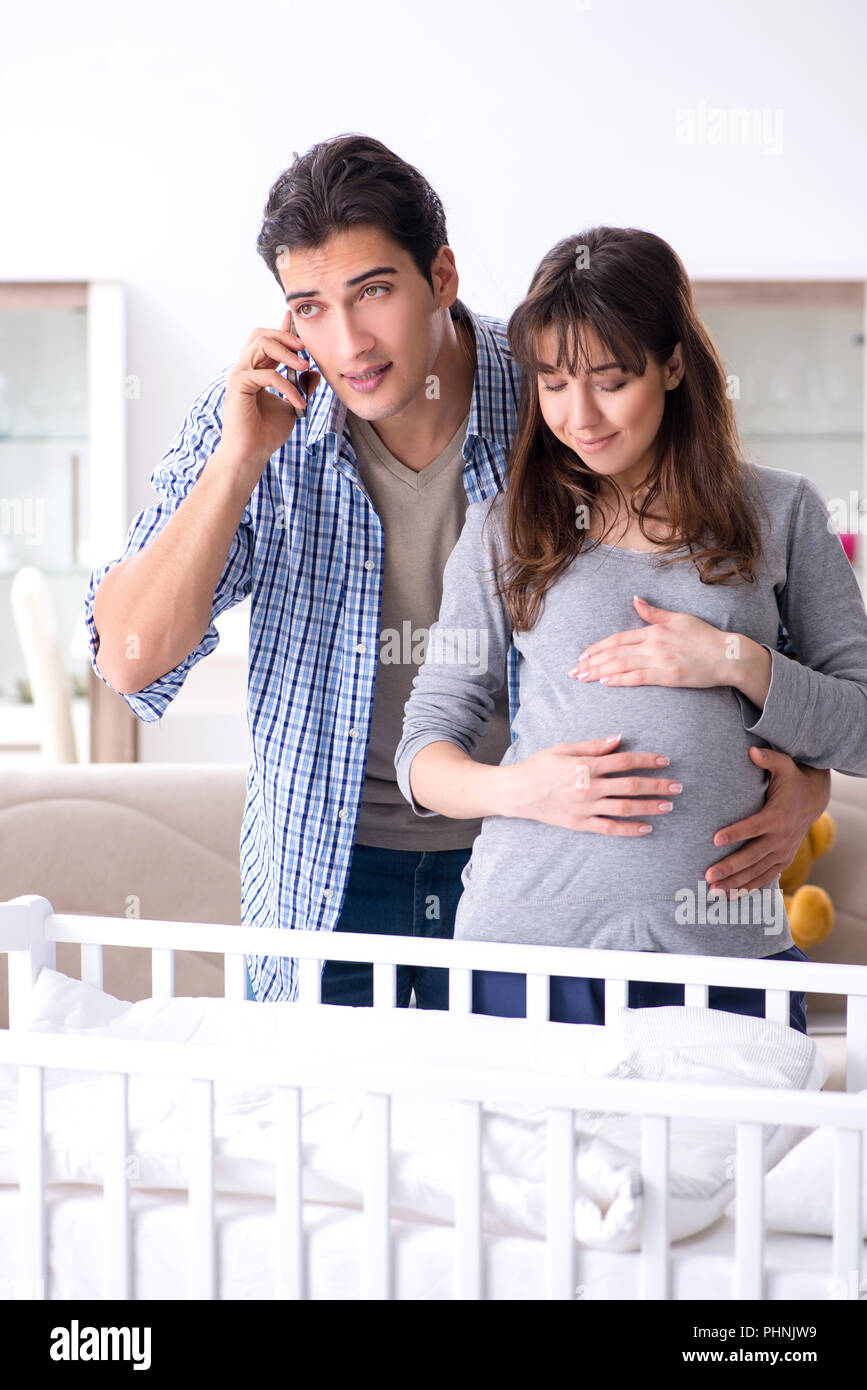 Young parents expecting their first baby Stock Photo - Alamy