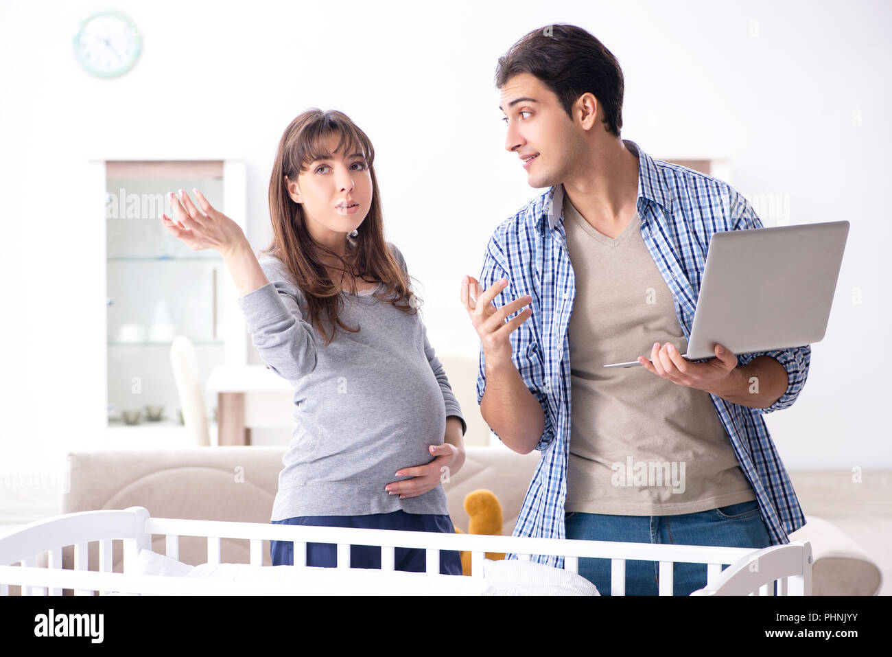 Young parents expecting their first baby Stock Photo - Alamy