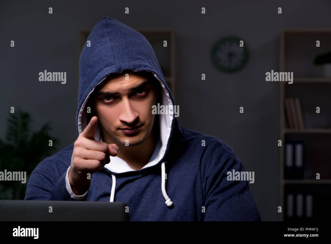 Hacker hacking the data late at night Stock Photo - Alamy