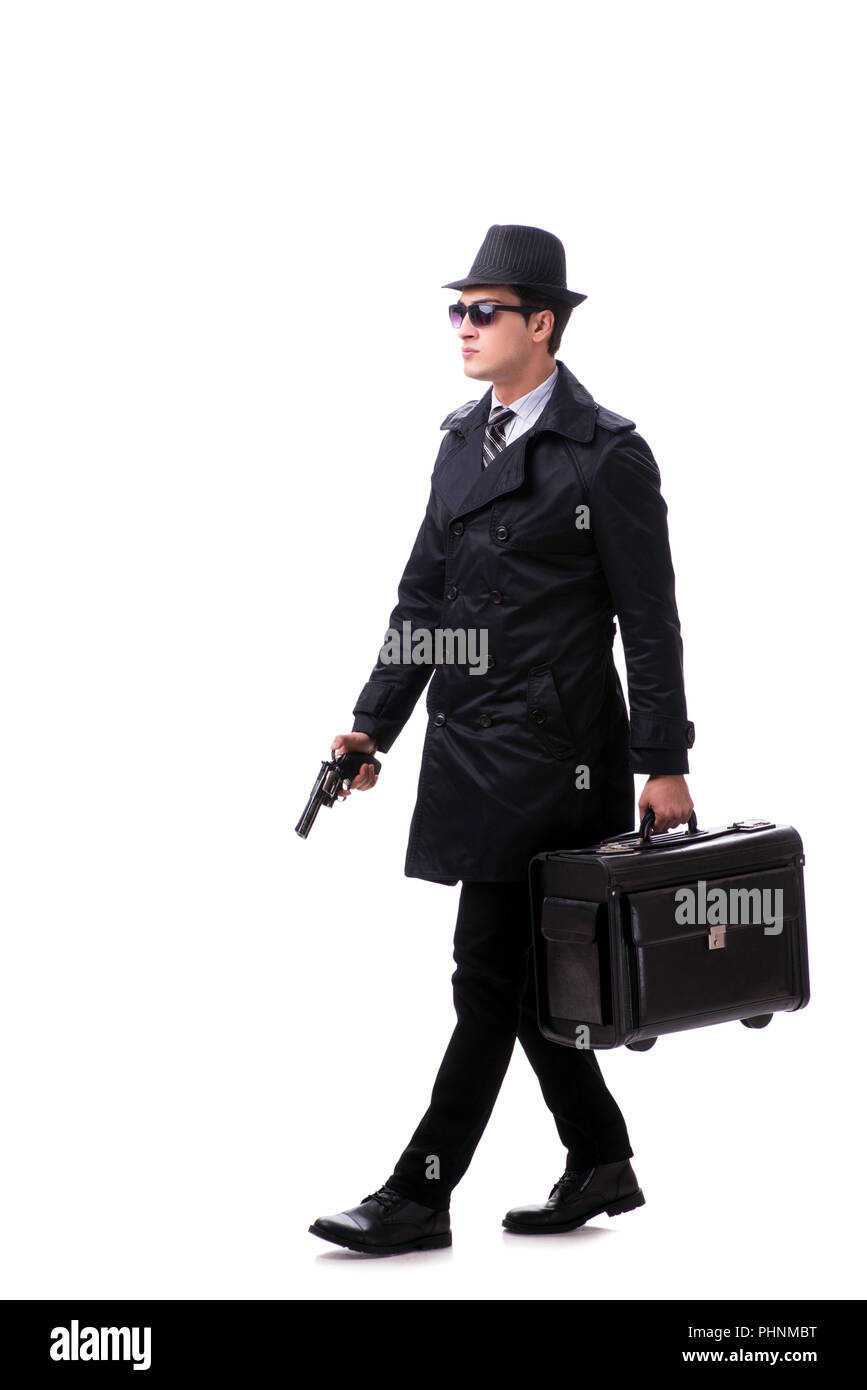 Man spy with handgun isolated on white background Stock Photo - Alamy