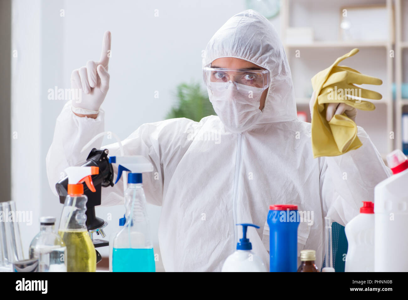 Chemist checking the quality of bathroom supplies Stock Photo - Alamy