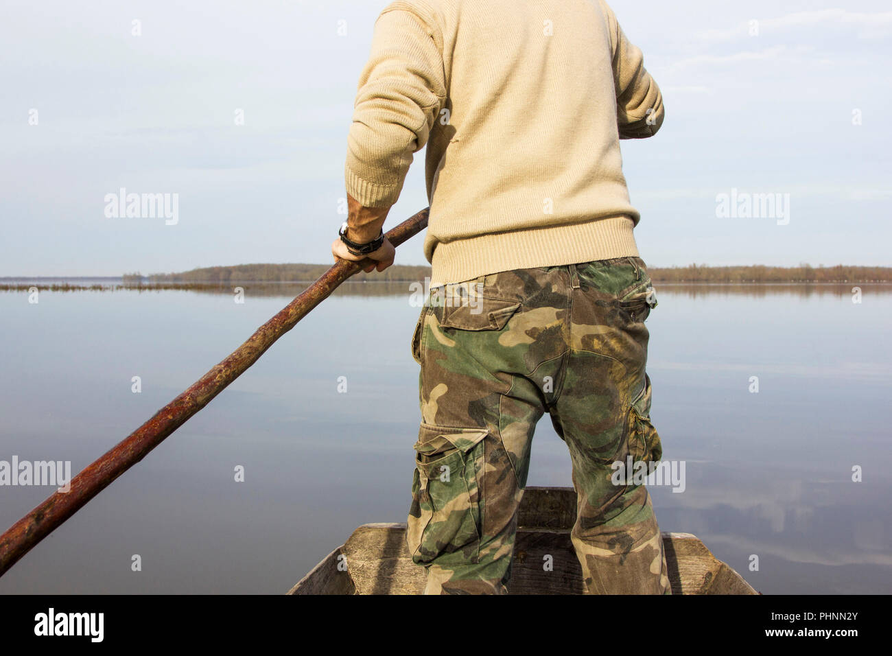 Man in boat on the river, rowing, adventure, real Stock Photo - Alamy