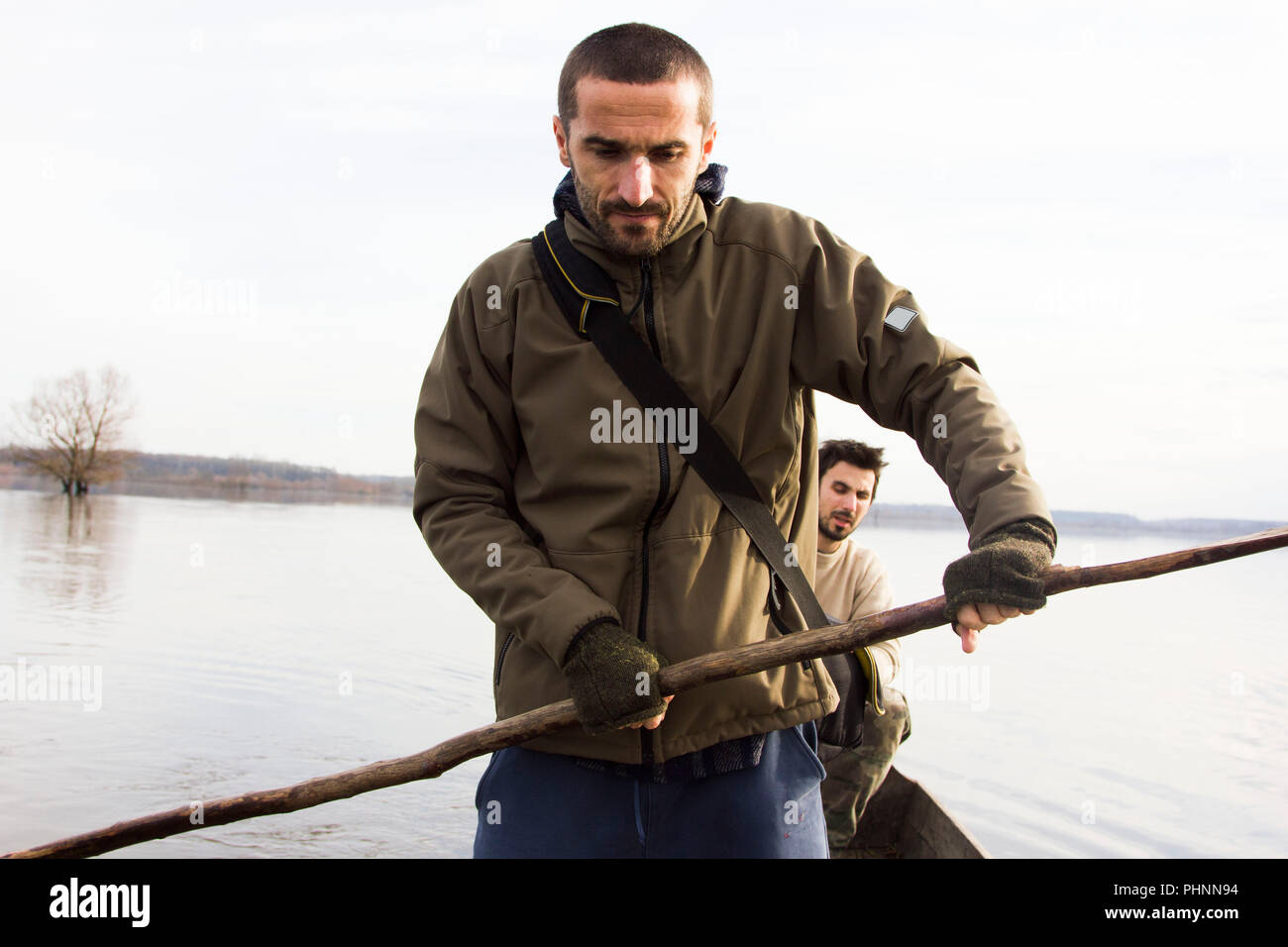 Man in boat on the river, rowing, adventure, real Stock Photo - Alamy