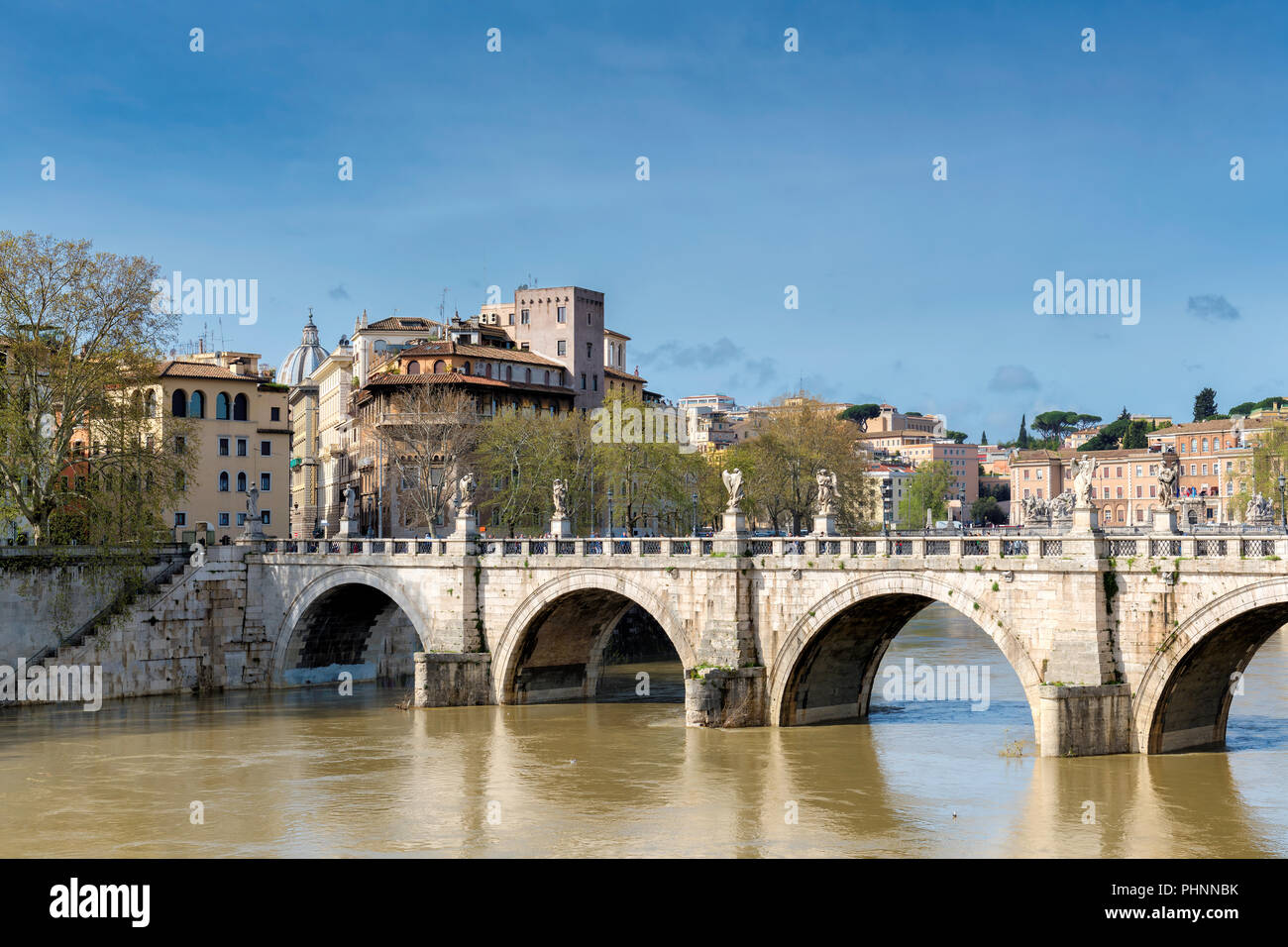 Rome downtown skyline with bridge on river Tiber at sunny day in Rome ...