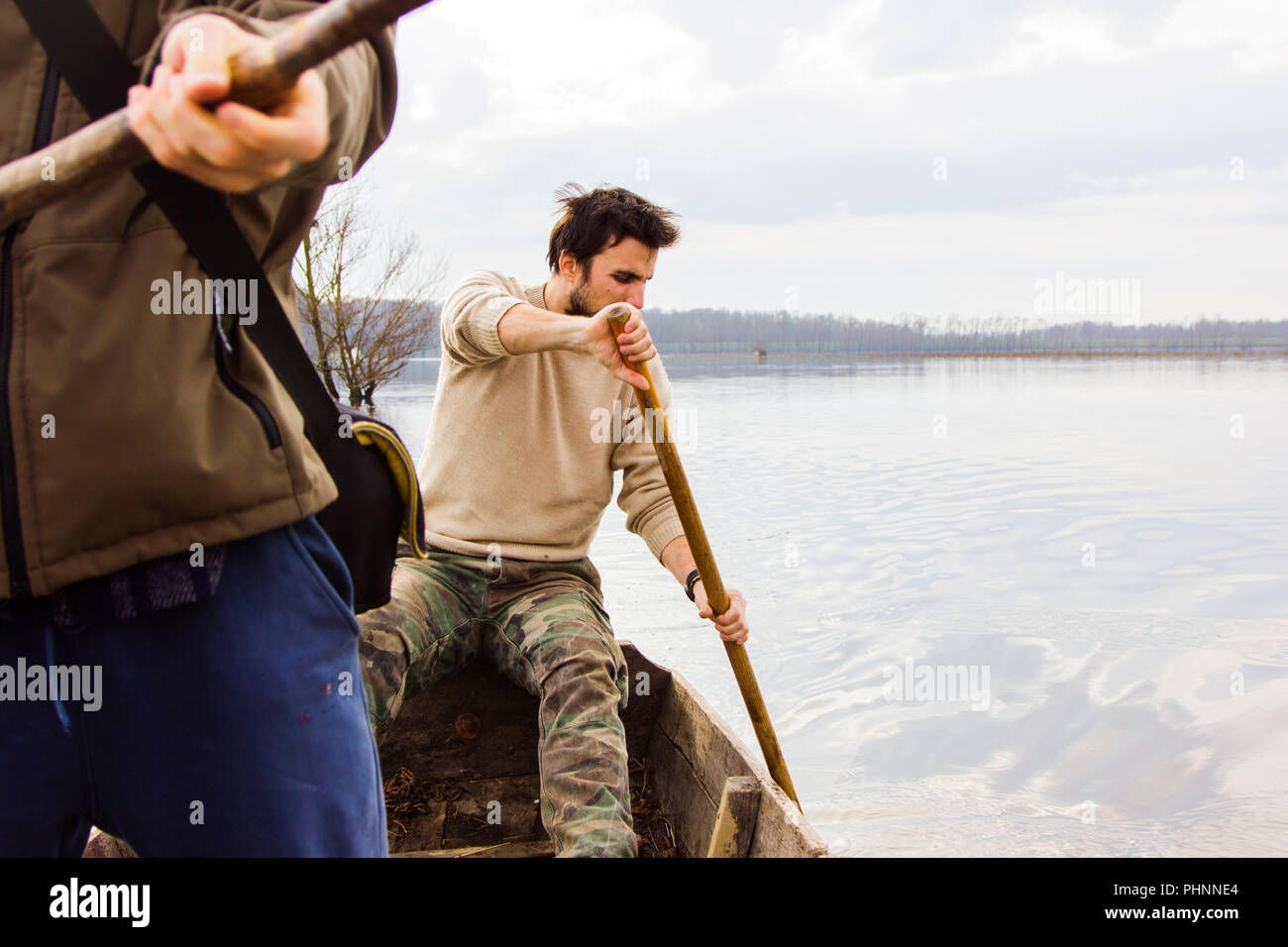 Man in boat on the river, rowing, adventure, real Stock Photo - Alamy