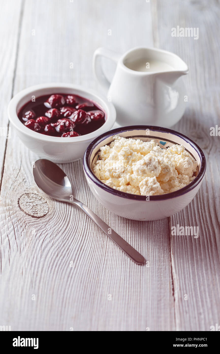 Cottage cheese with cherry jam Stock Photo - Alamy