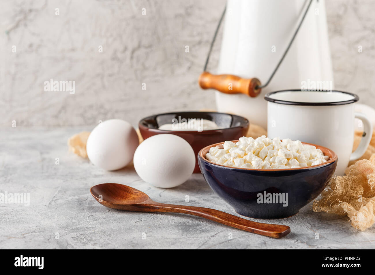 Granulated cottage cheese and sour cream Stock Photo - Alamy