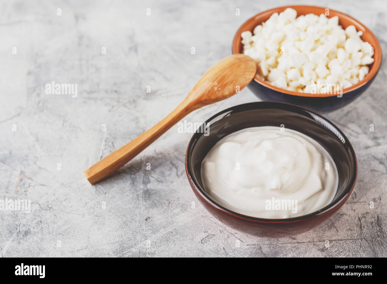 Granulated cottage cheese and sour cream Stock Photo - Alamy