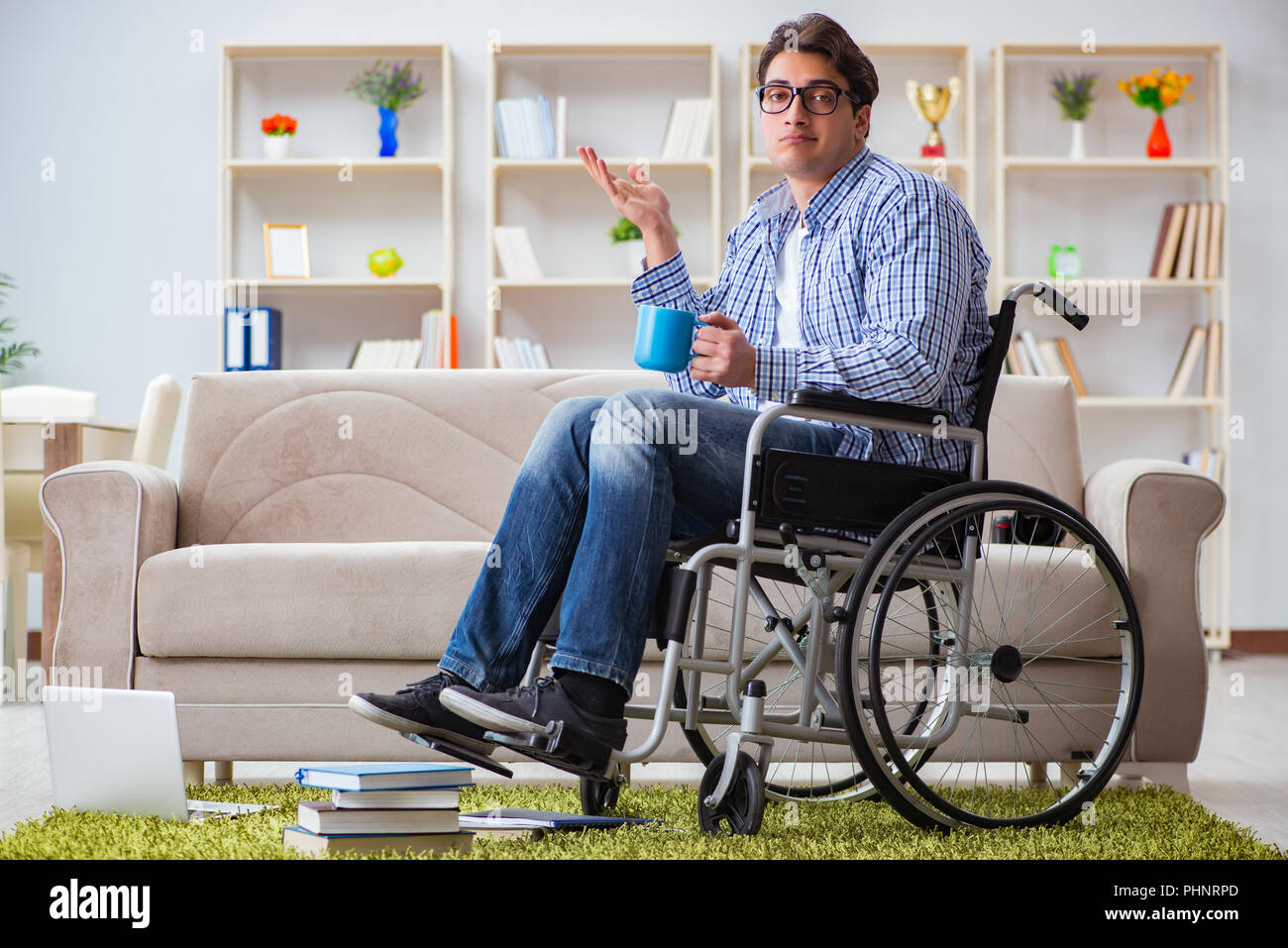 Young student studying at home Stock Photo - Alamy