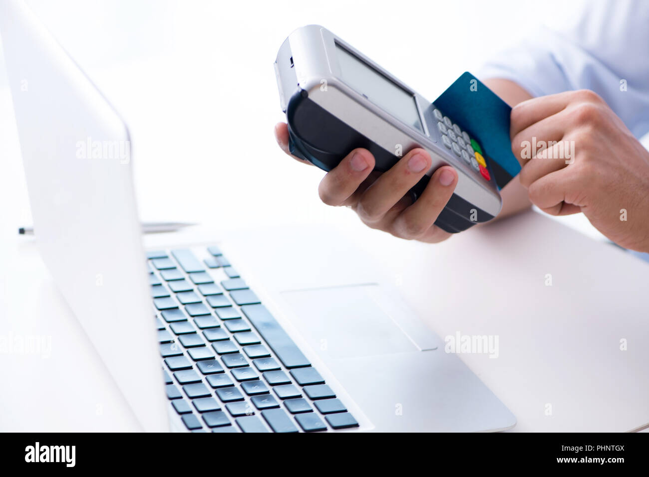 Man processing credit card transaction with POS terminal Stock Photo ...