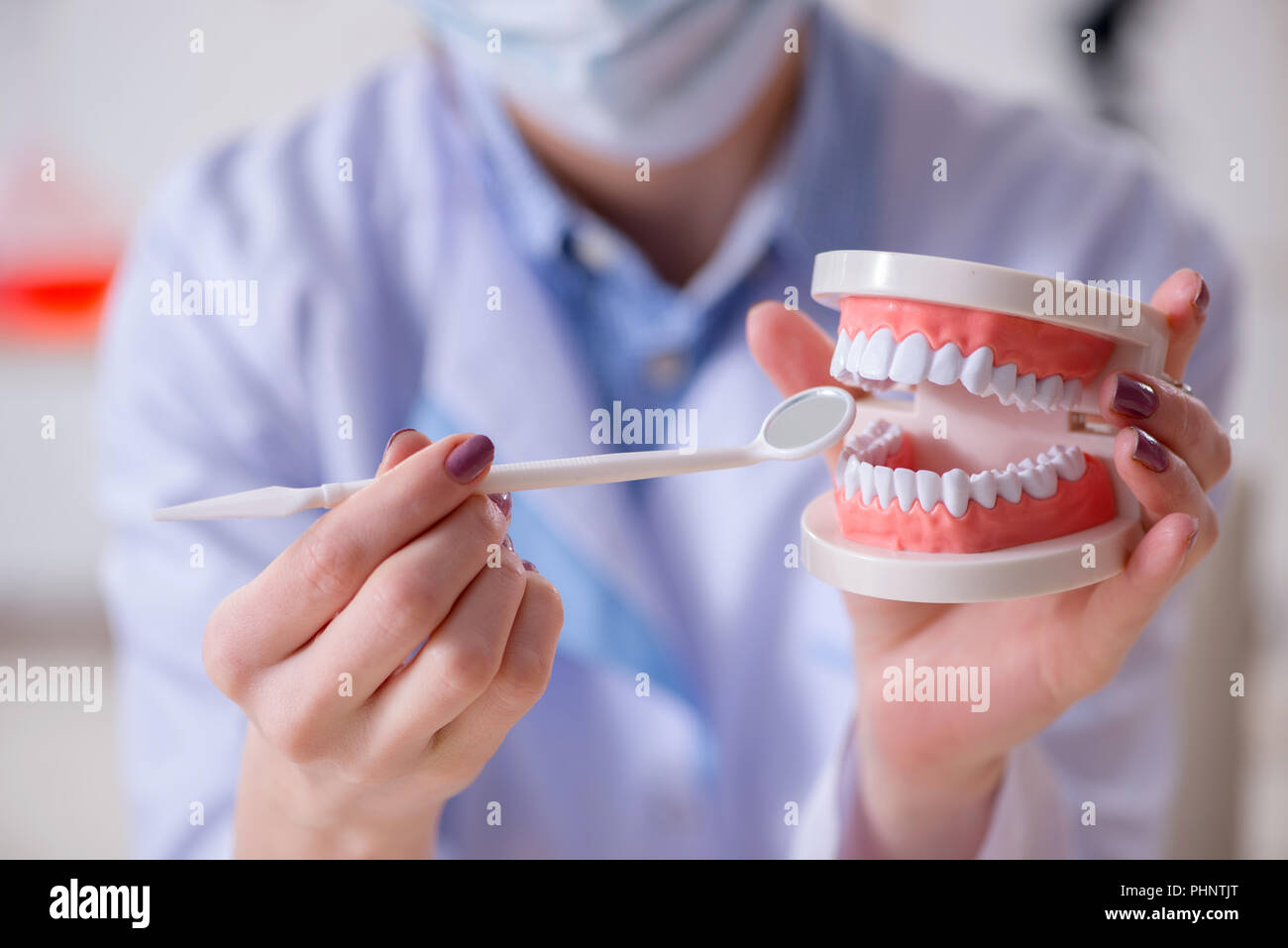 Dentist practicing work on tooth model Stock Photo - Alamy