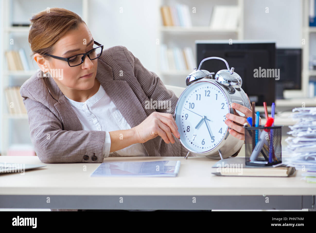 Businesswoman workaholic trying finish hi-res stock photography and ...