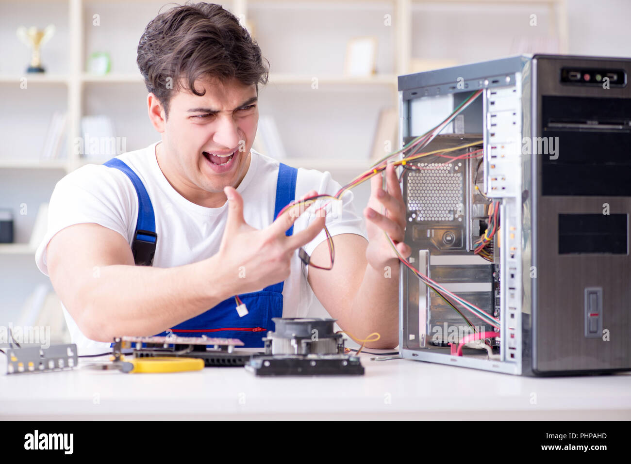 Computer repair concept tweezers hi-res stock photography and images ...