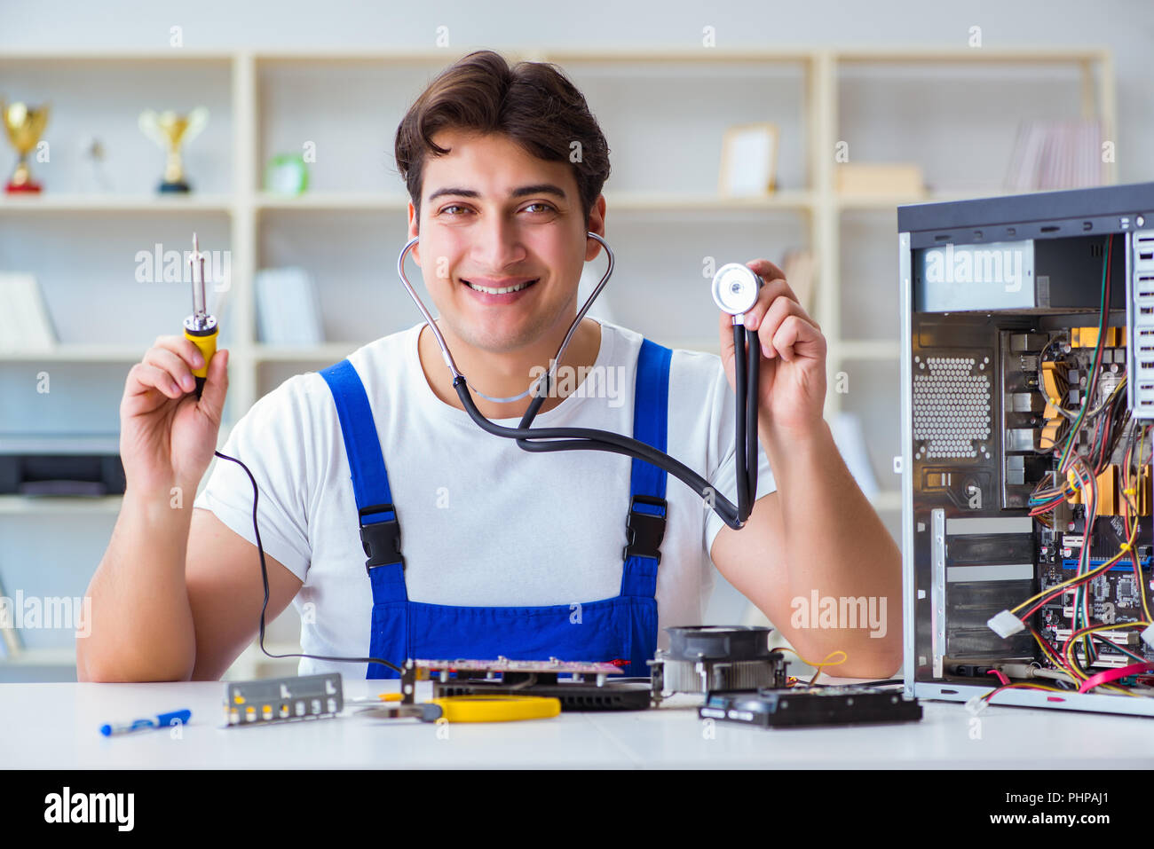 Computer repair concept tweezers hi-res stock photography and images ...