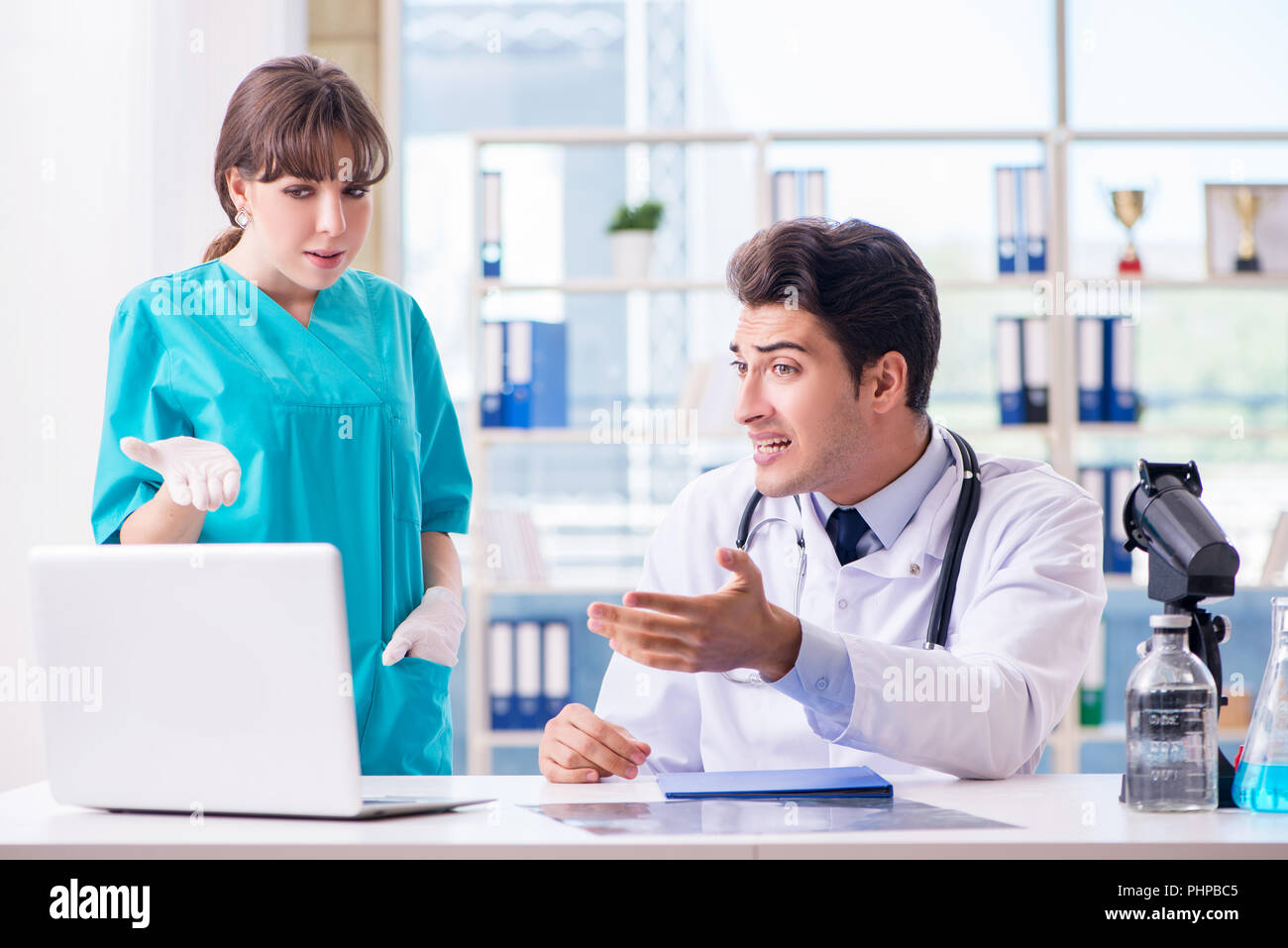 Angry doctor computer hi-res stock photography and images - Alamy