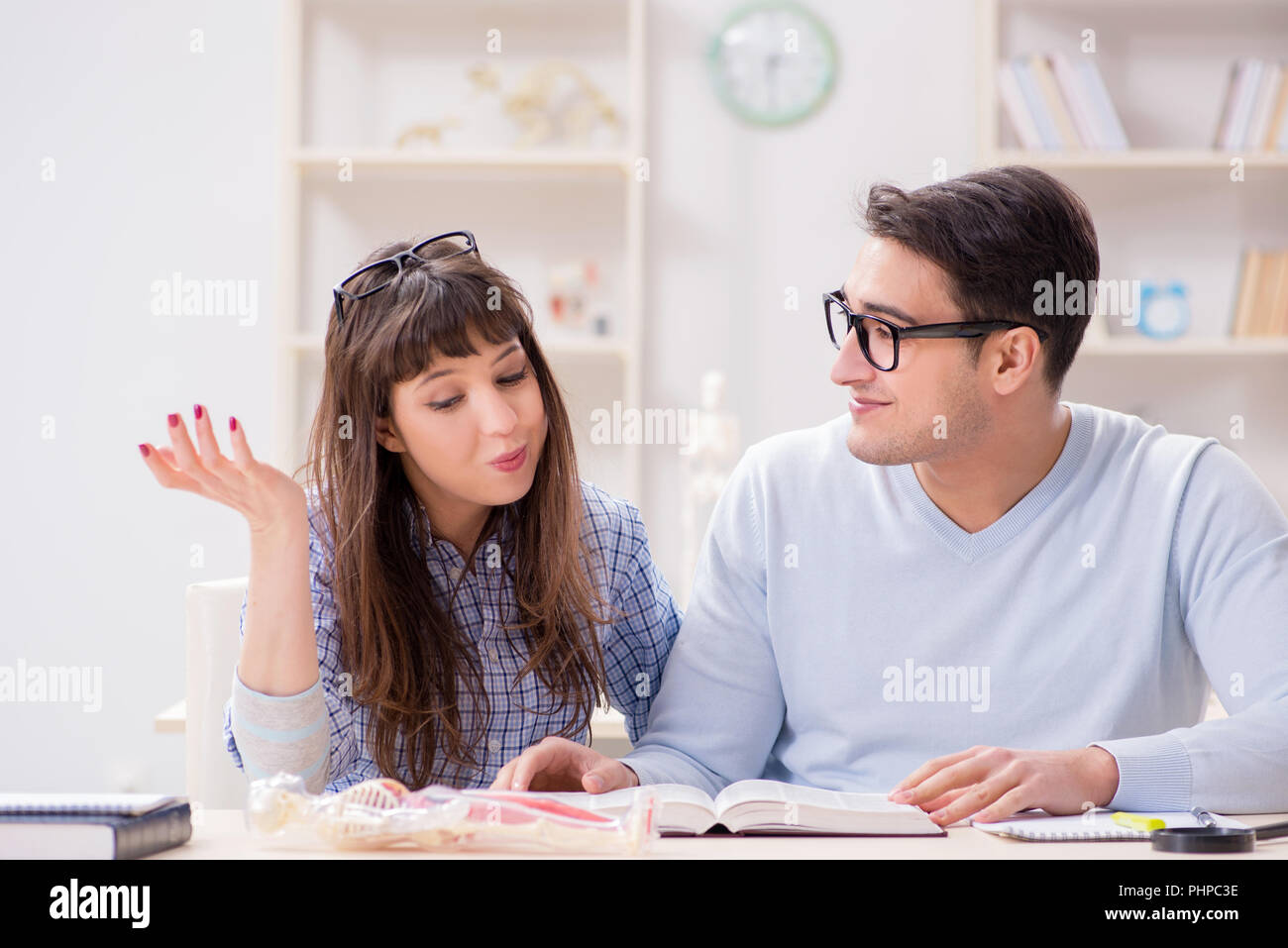 Two medical students studying in classroom Stock Photo - Alamy