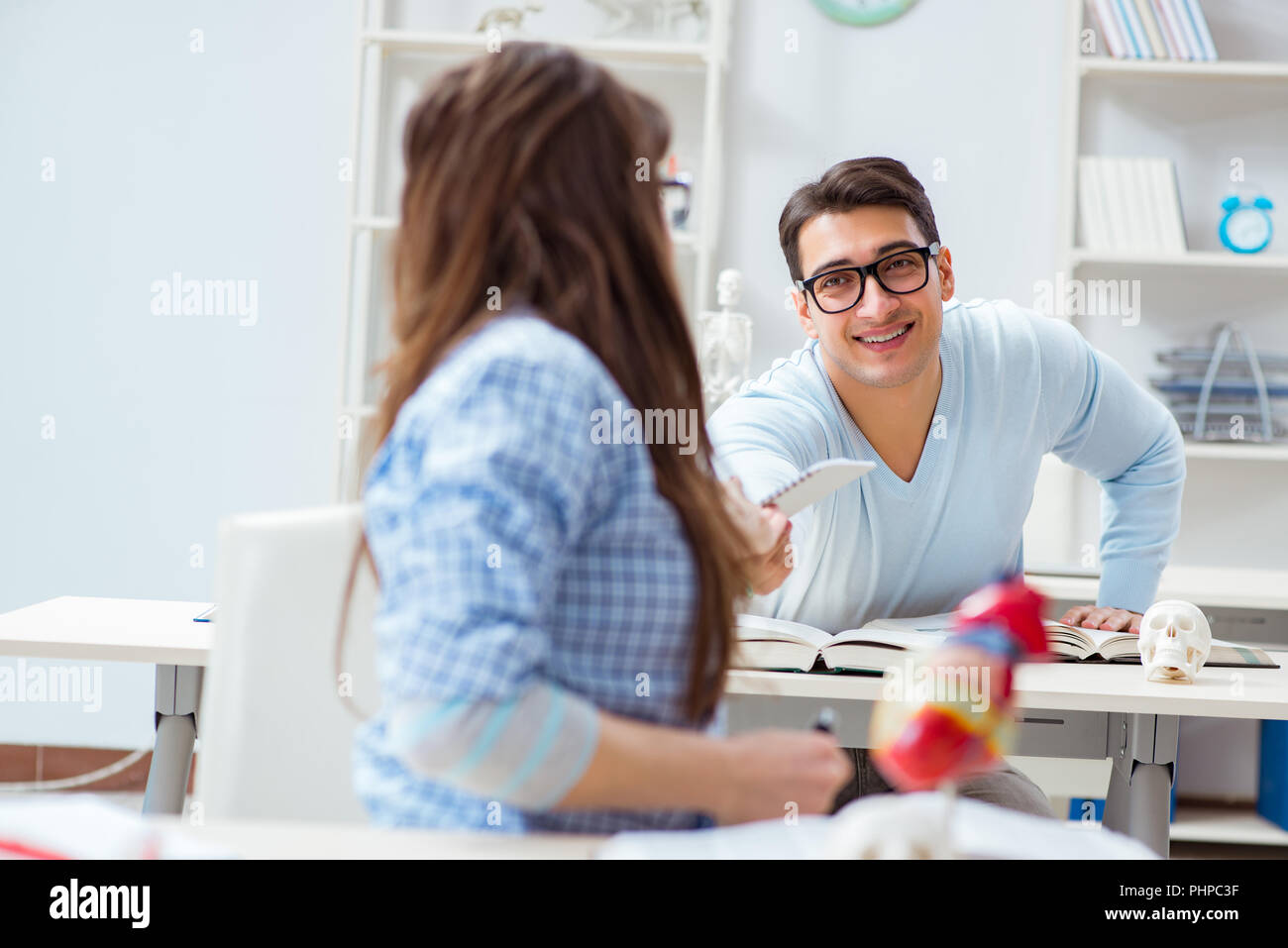 Two medical students studying in classroom Stock Photo - Alamy