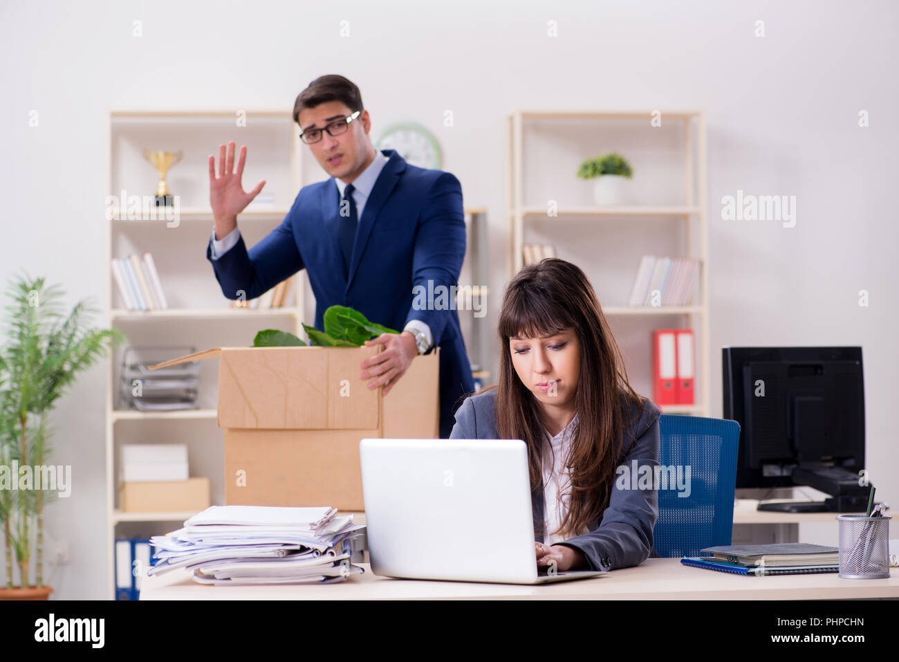 Person being fired from his work Stock Photo - Alamy