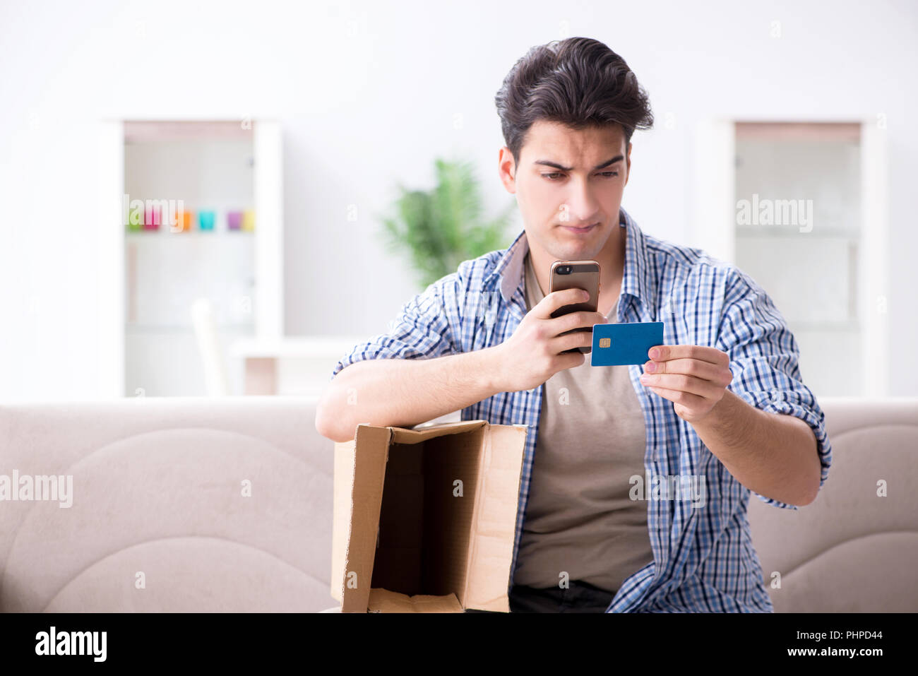 Man receiving empty parcel with stolen goods Stock Photo - Alamy
