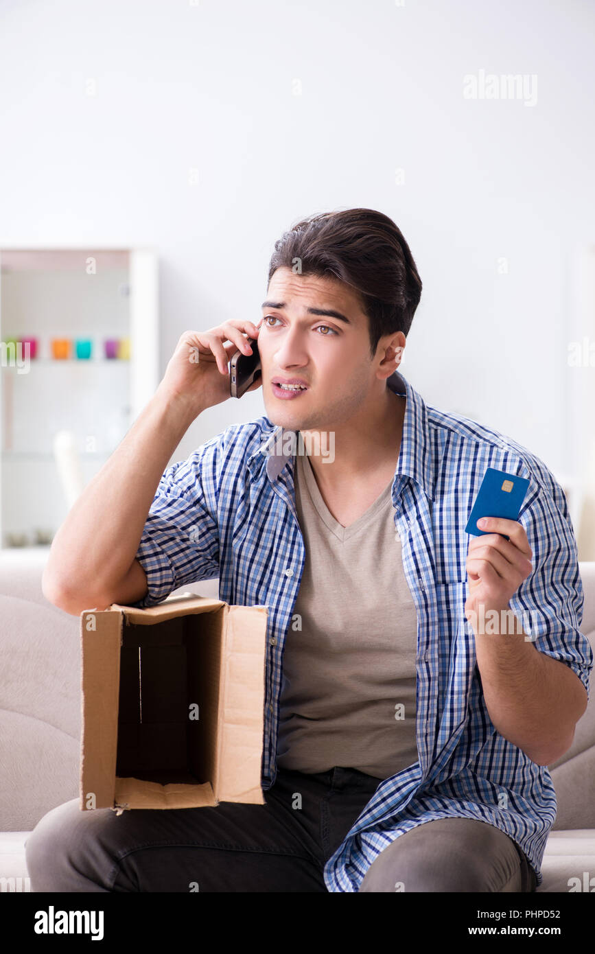 Man receiving empty parcel with stolen goods Stock Photo - Alamy