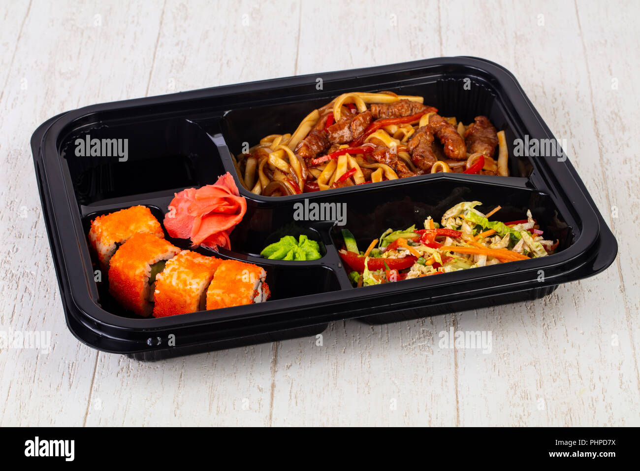 Bento set with roll, noodle and meat Stock Photo - Alamy