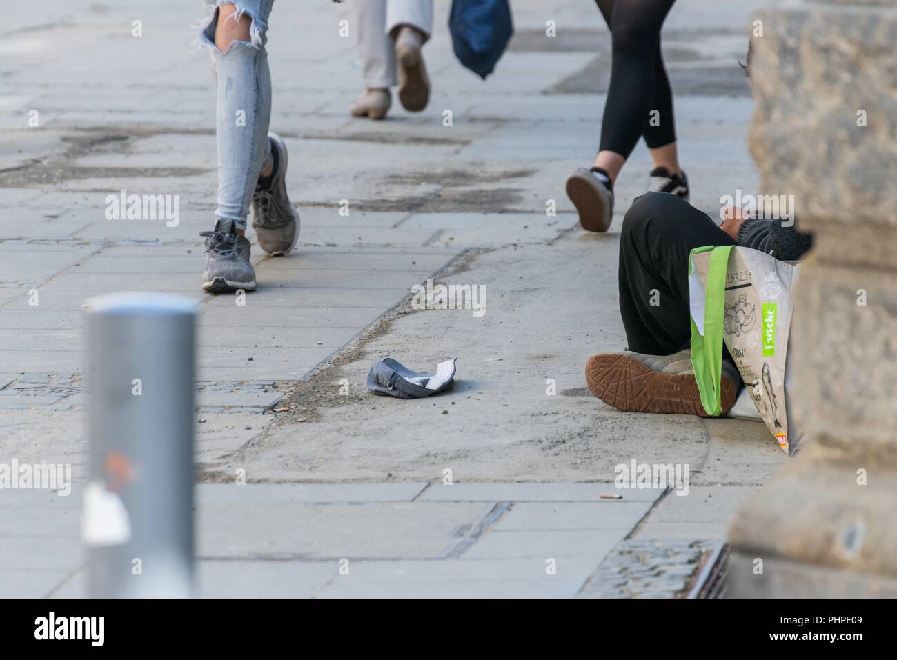 Person helping beggar hi-res stock photography and images - Alamy