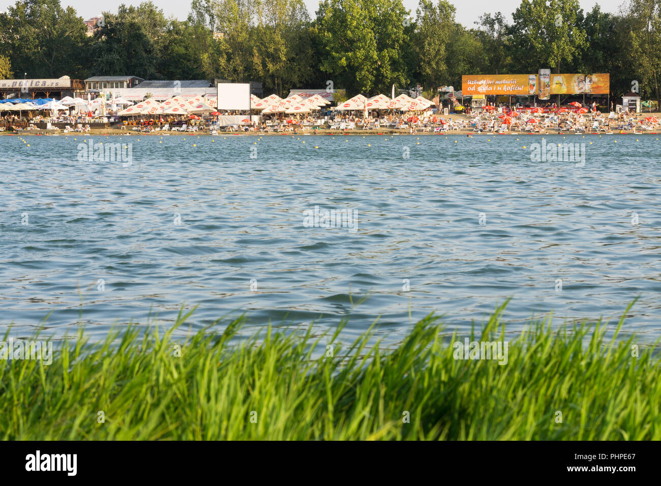 View of the crowded beach at the Ada Ciganlija lake in Belgrade, Serbia ...