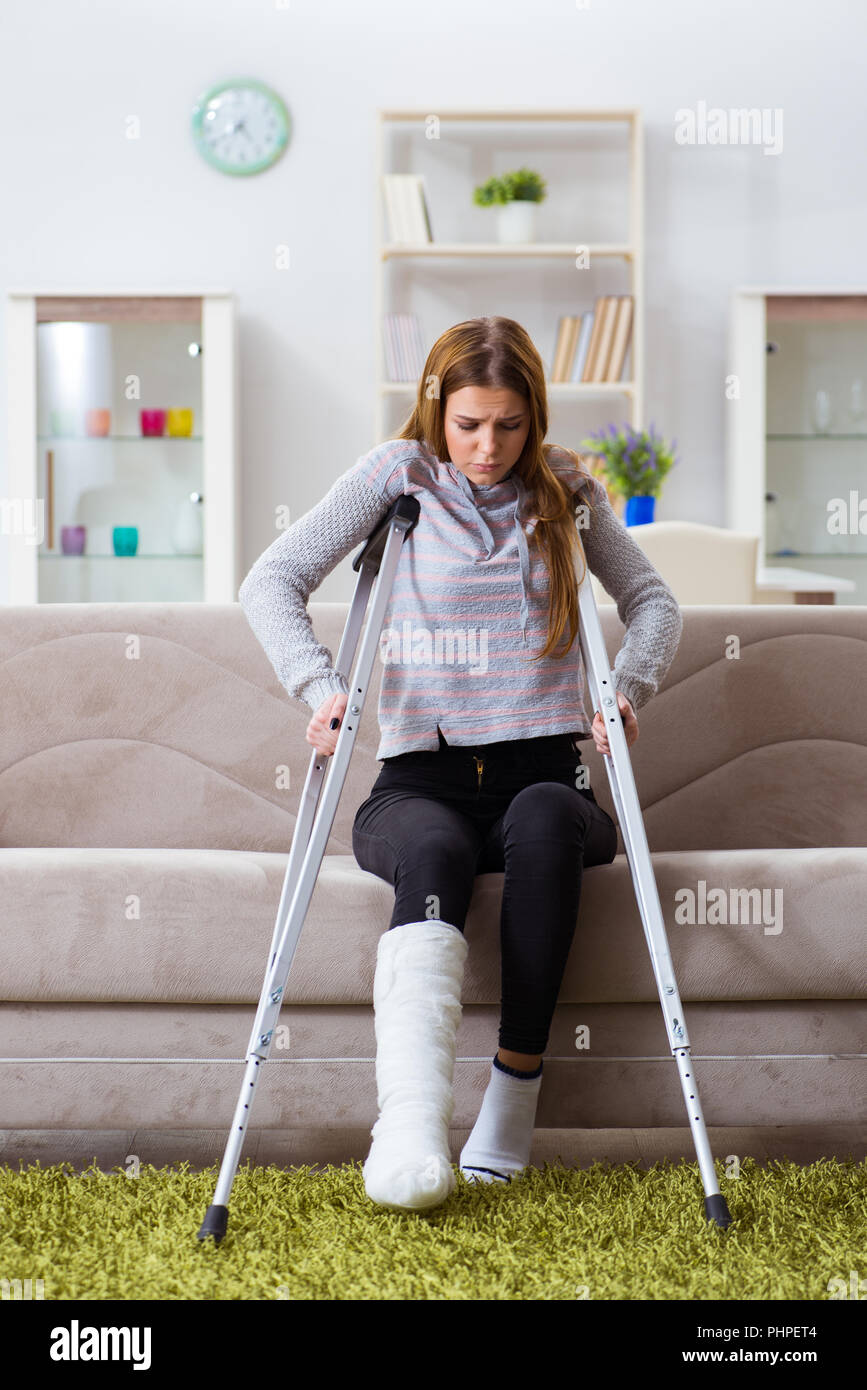 Young woman with broken leg at home Stock Photo - Alamy