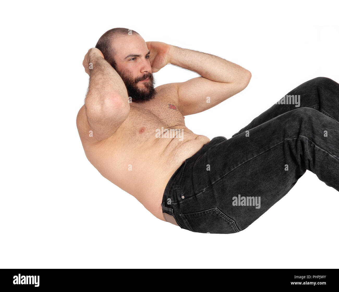 Man doing stomach crunches in the studio Stock Photo - Alamy