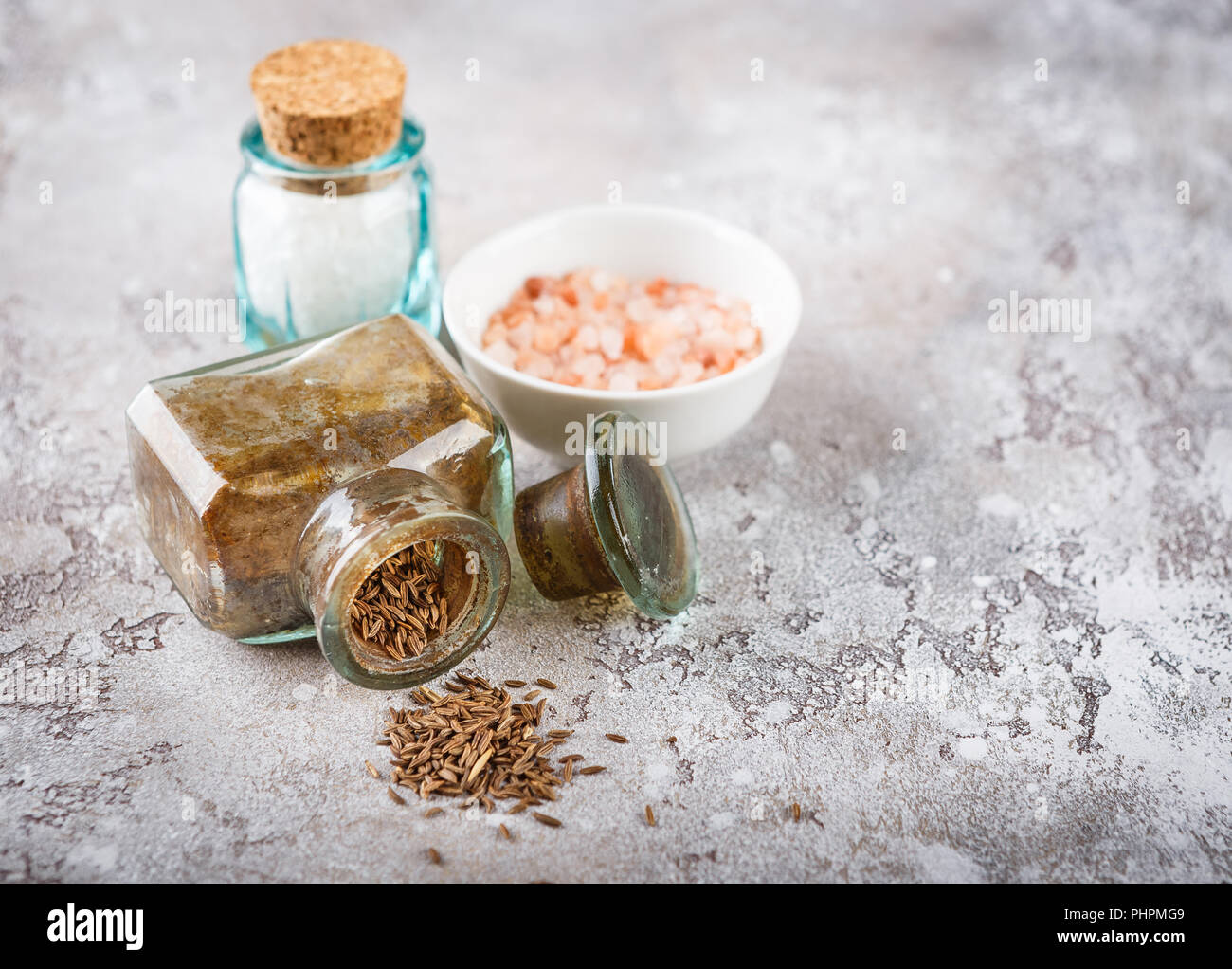 Cumin seeds in bottle and salt Stock Photo - Alamy