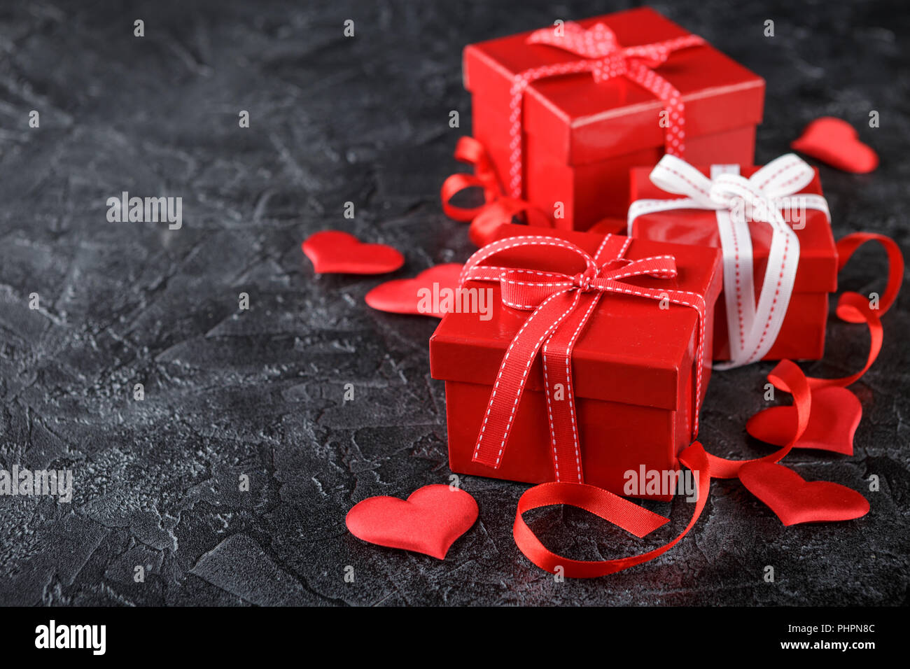 Red gift boxes Stock Photo - Alamy