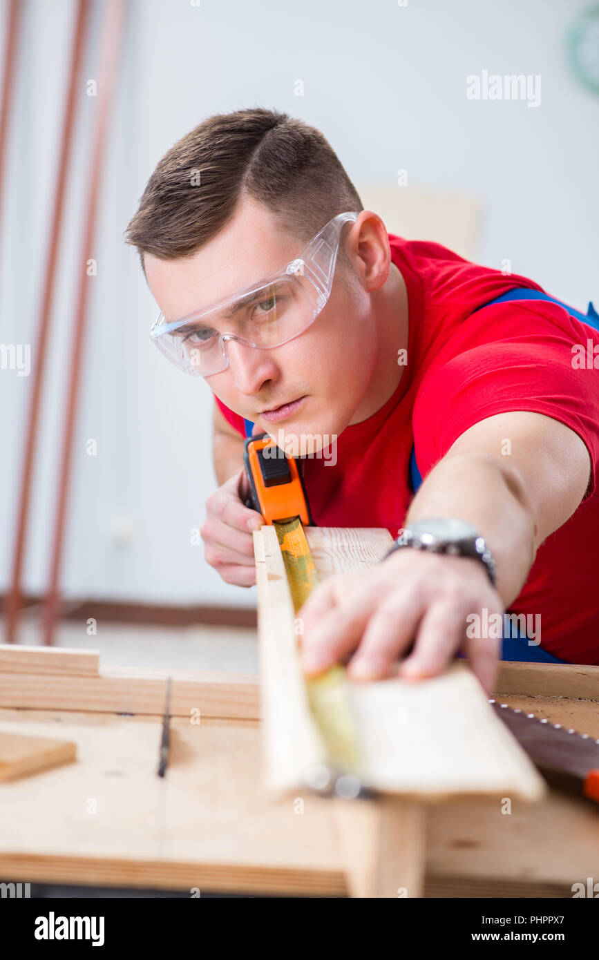 Contractor working in the workshop Stock Photo - Alamy