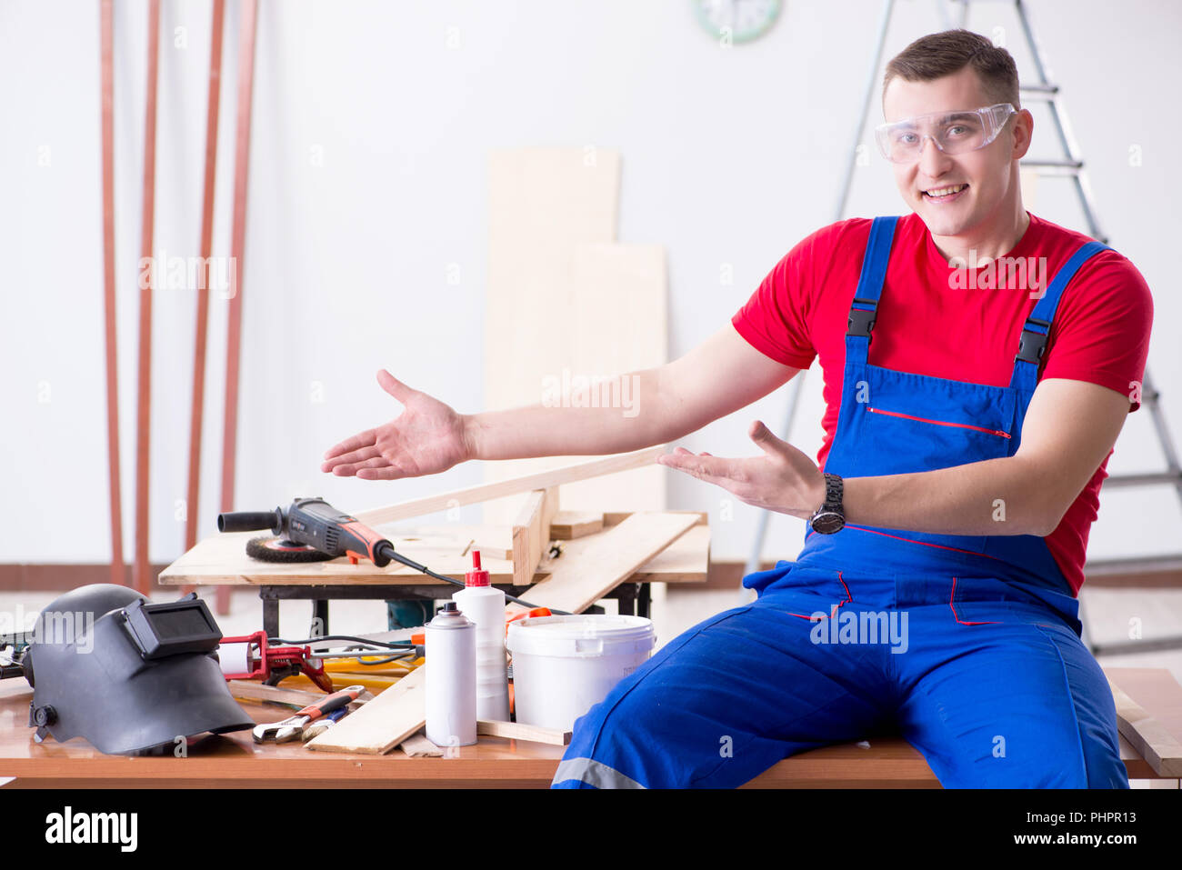Contractor working in the workshop Stock Photo - Alamy