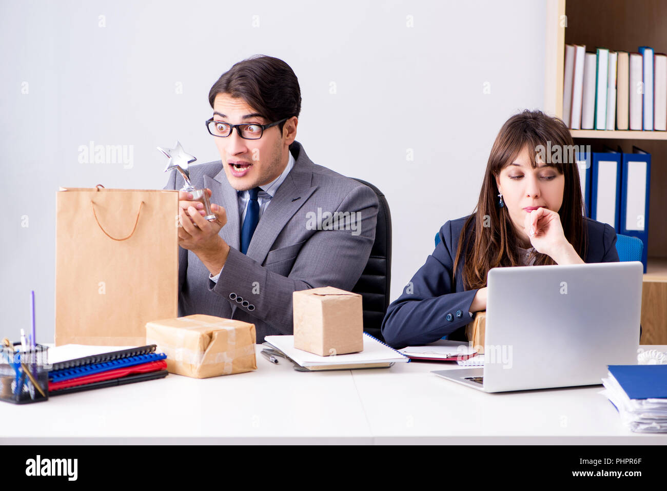 Business people receiving new mail and parcels Stock Photo - Alamy