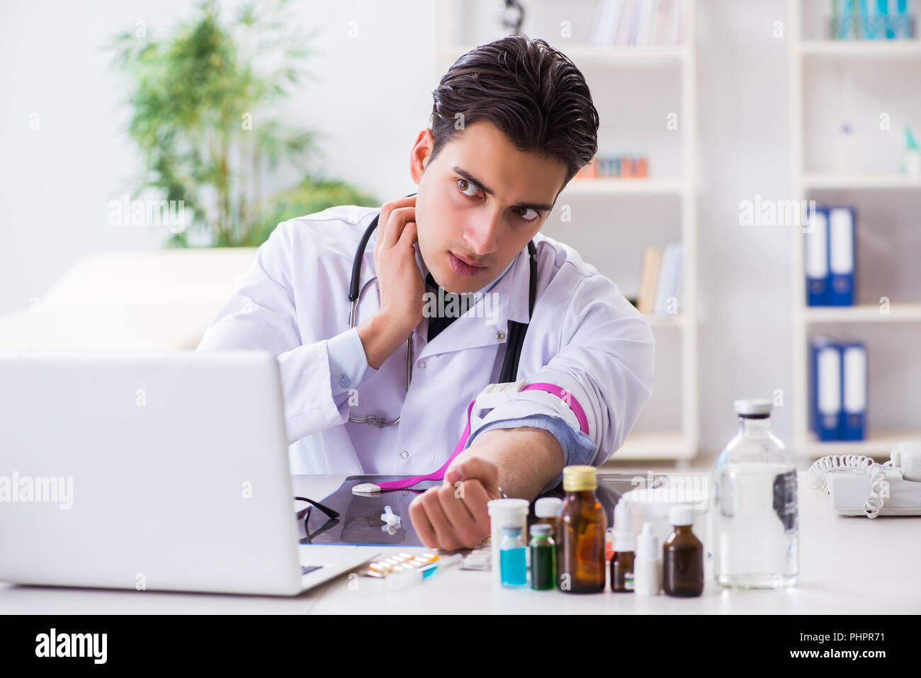 Doctor drug addict in hi-res stock photography and images - Alamy