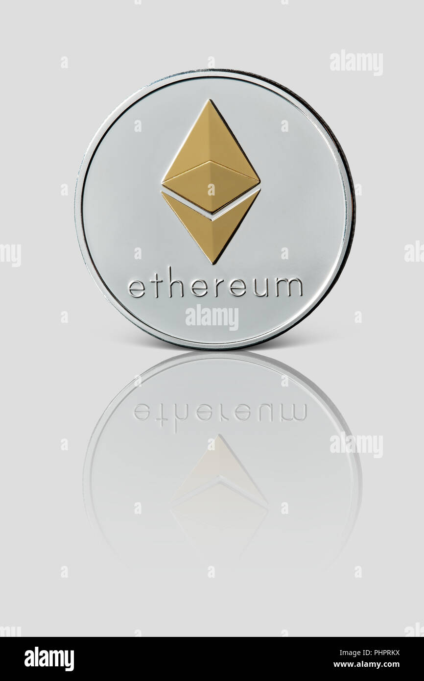 Ethereum coin isolated on glossy white background Stock Photo - Alamy