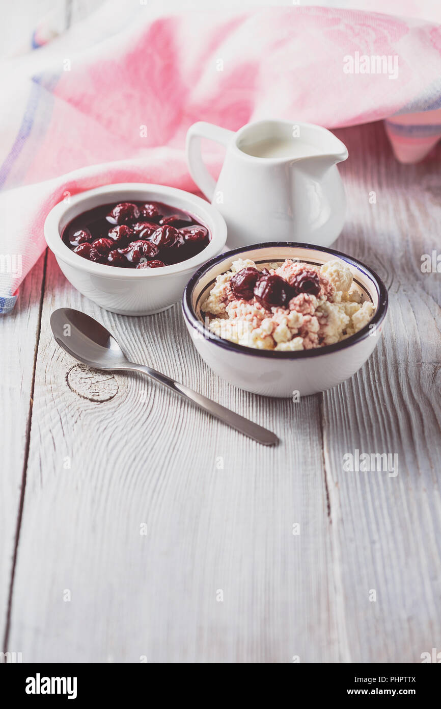 Cottage cheese with cherry jam Stock Photo - Alamy