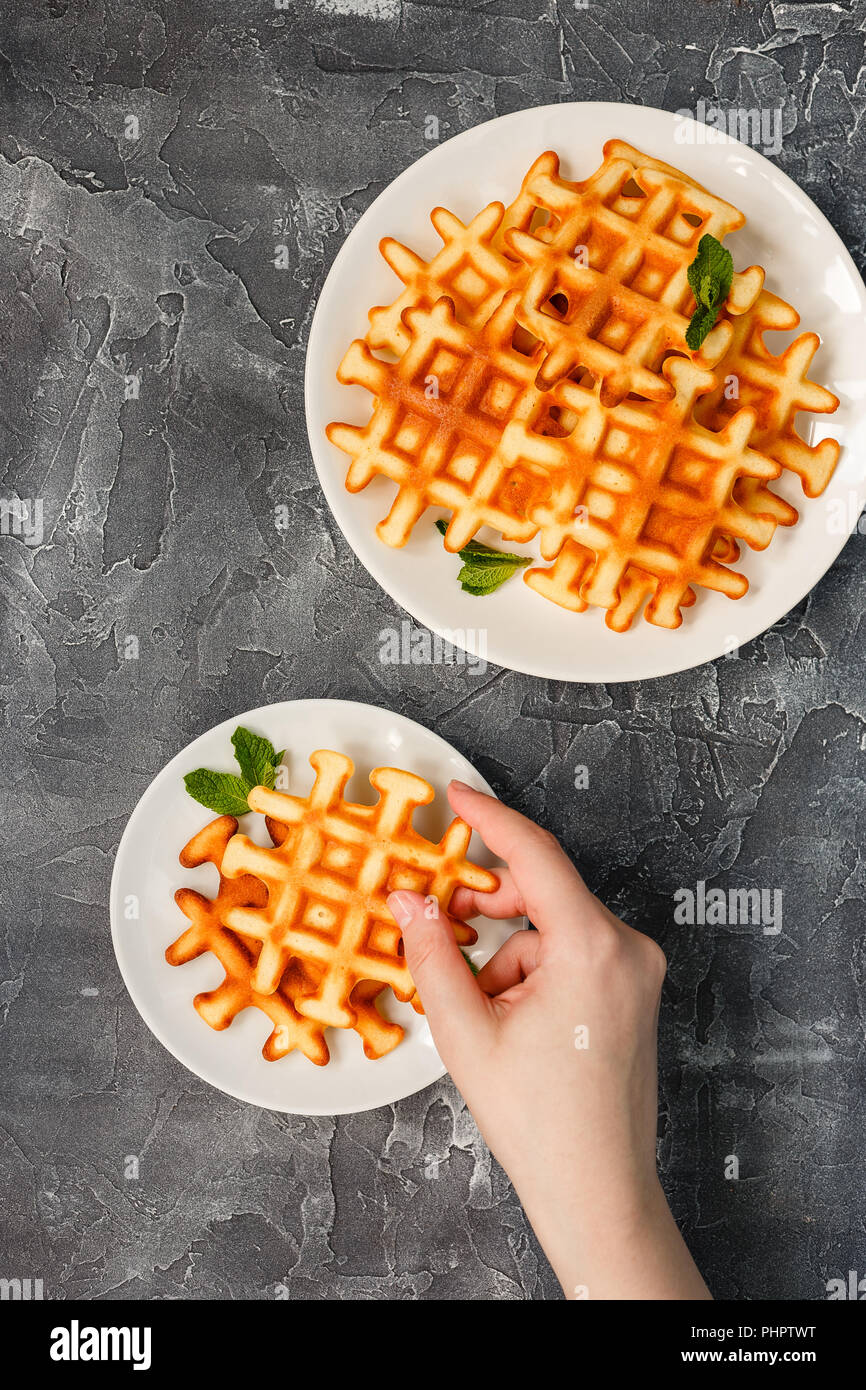 Top view of Belgian waffles on table Stock Photo - Alamy