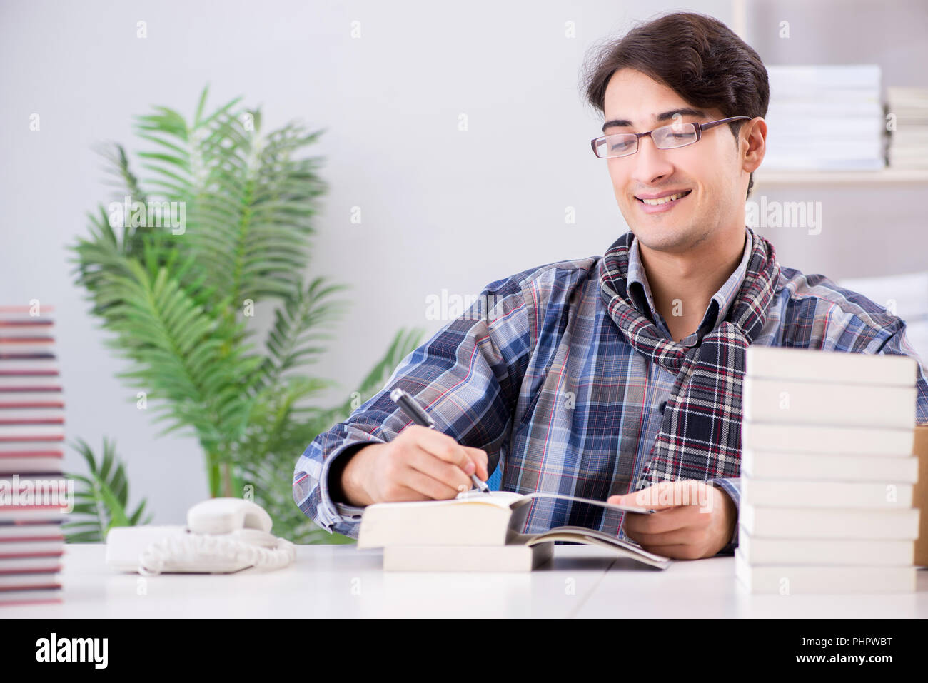 Writer presenting his books to public Stock Photo - Alamy