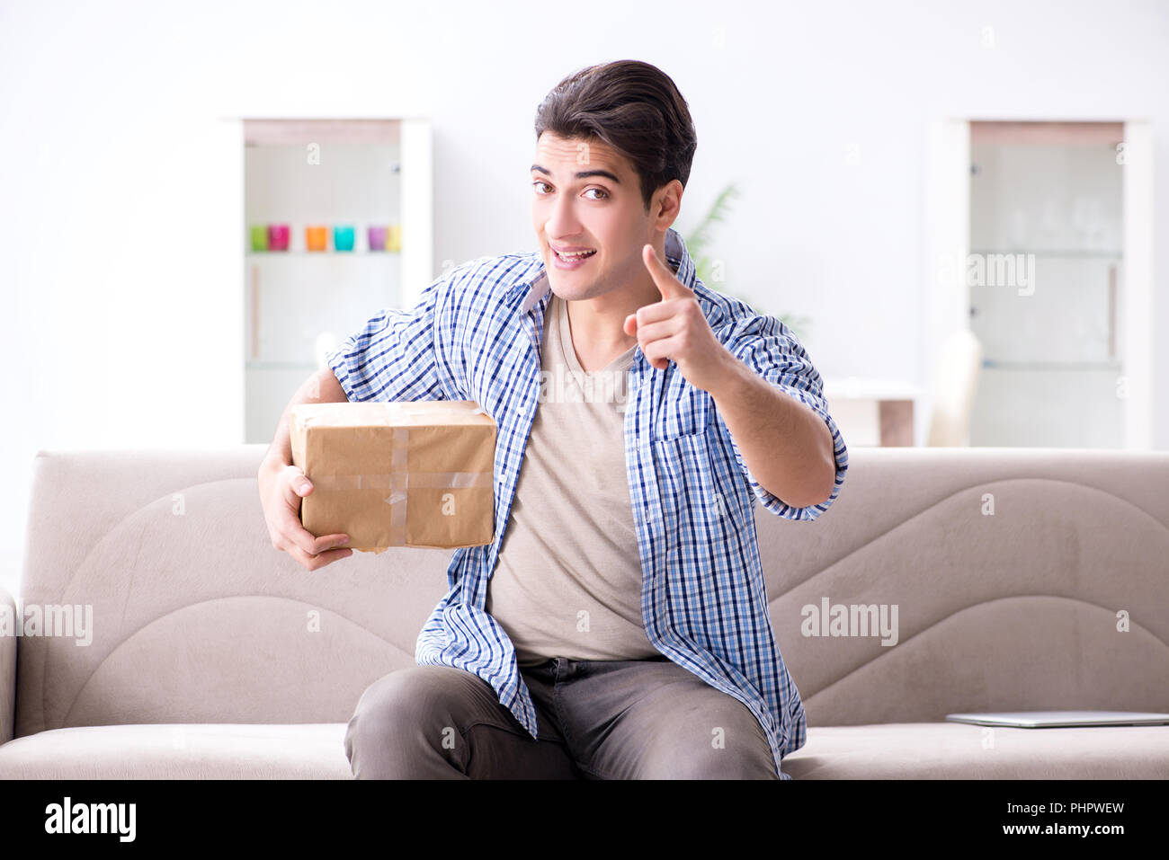 Man receiving and pointing hi-res stock photography and images - Alamy